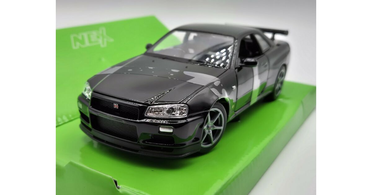 Nissan Skyline GT-R R34 Coupe (1999) - Welly - 1:24 | Pepita.hu