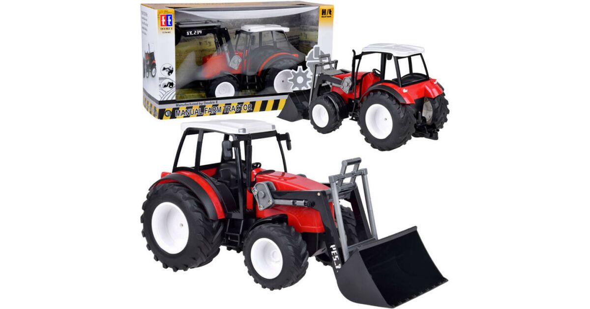 Nagy piros traktor mozgatható karral, kanállal és nagy kerekekkel ...